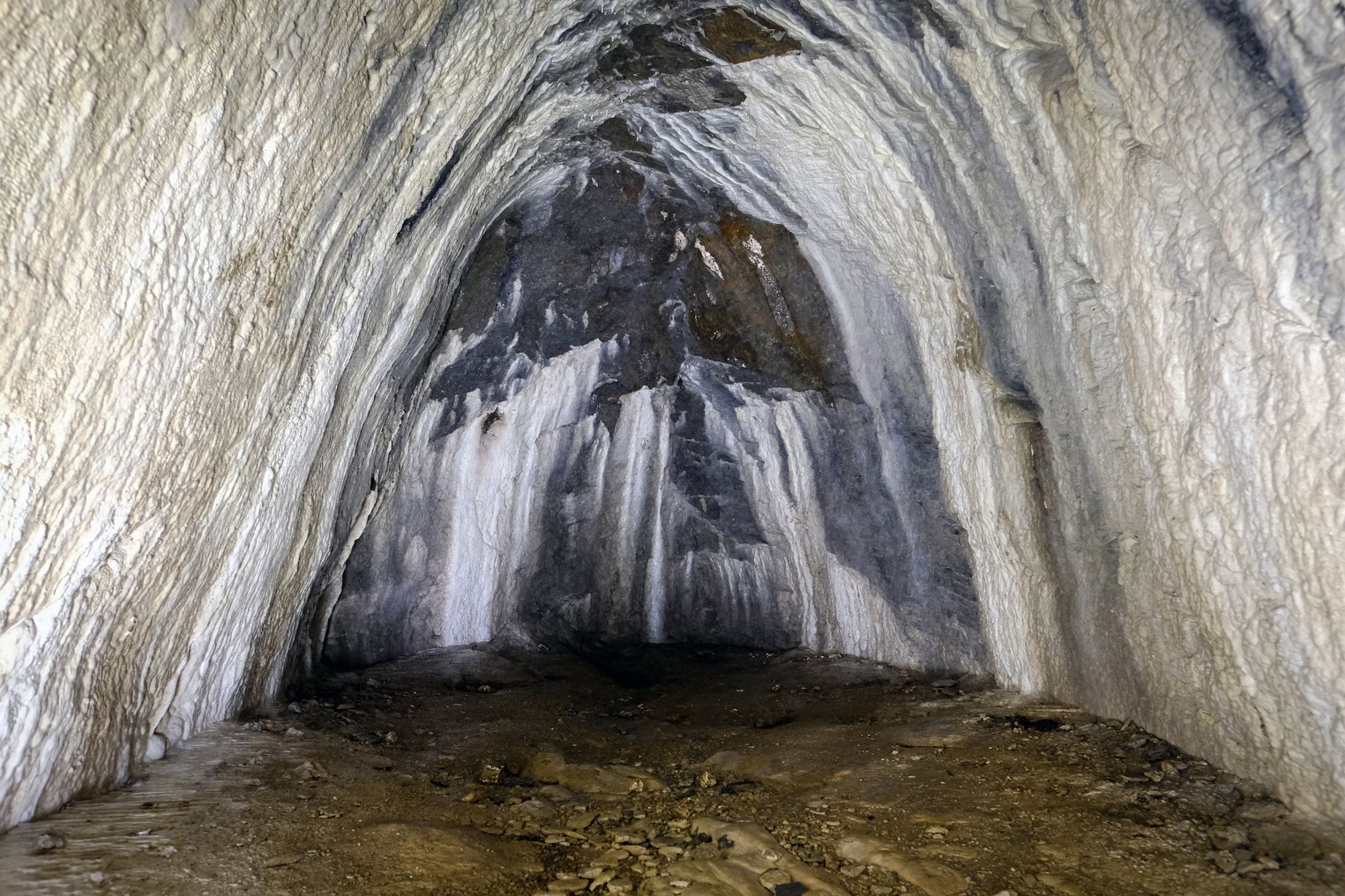 Inside mysterious woodland cave where Neolithic axe was found ...